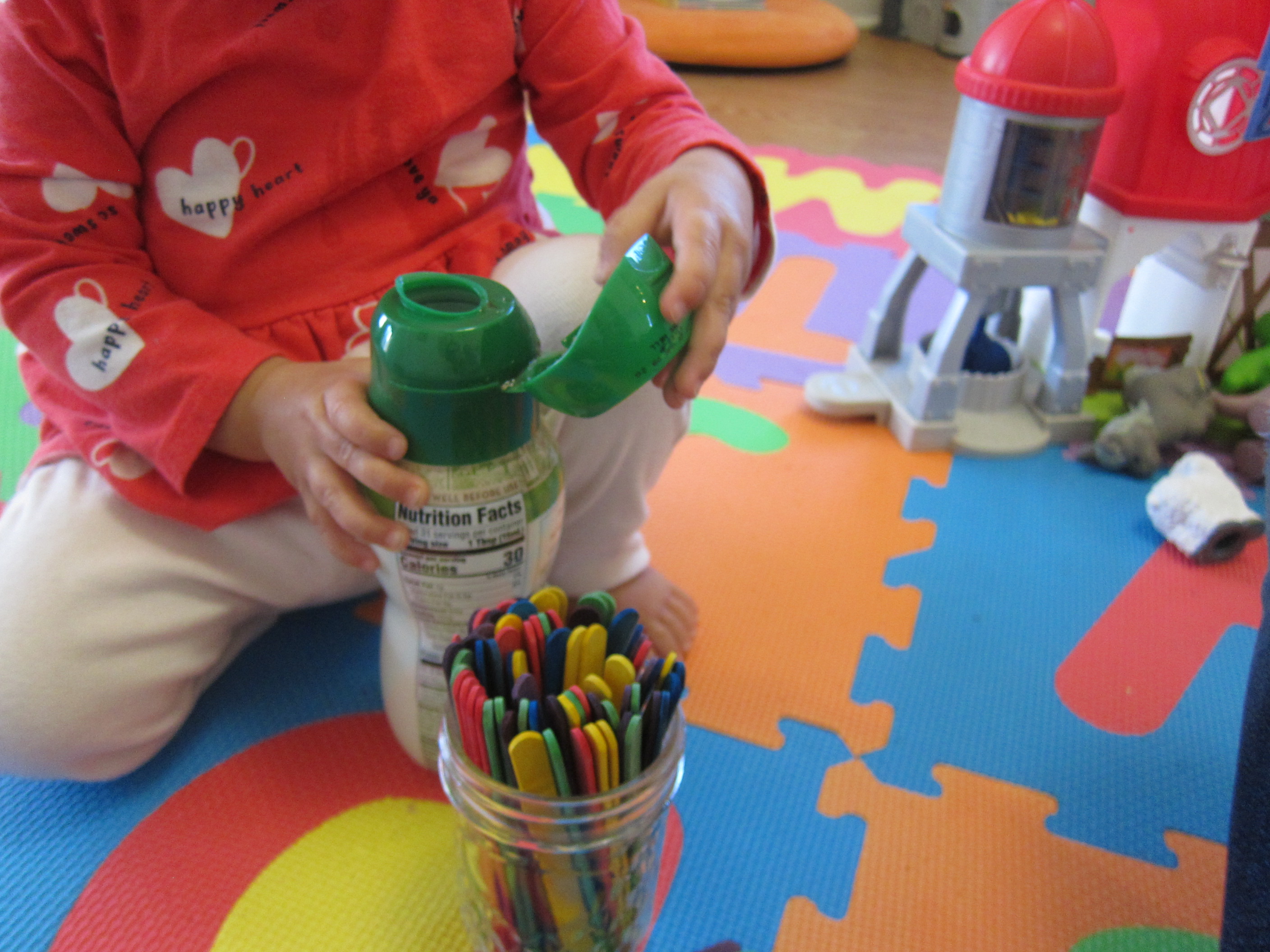 Fine Motor Activity: Craft Sticks + Plastic Bottle – joyful parenting